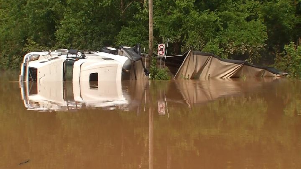 Driver of tractor-trailer washed away by flooding speaks out | WCHS